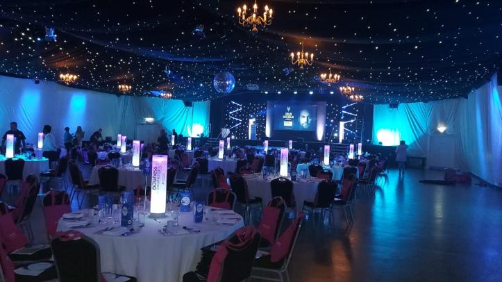 Inside pavilion in the dark with lights